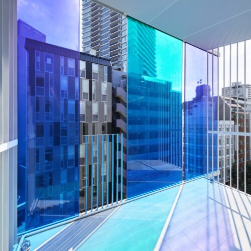 Vertical Rainbow Office Building / SAKO Architects